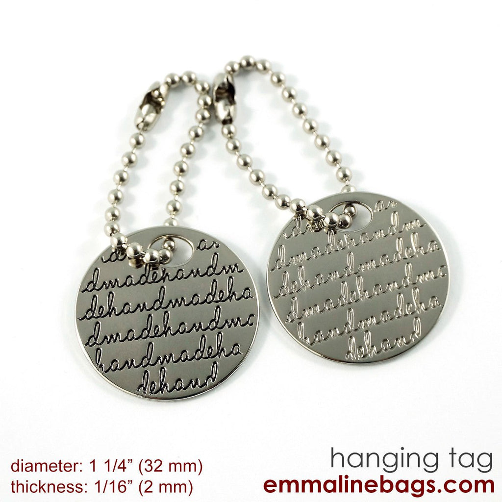 Metal Hanging Tag: Small Circle "handmade" in Nickel - Emmaline Bags Inc.